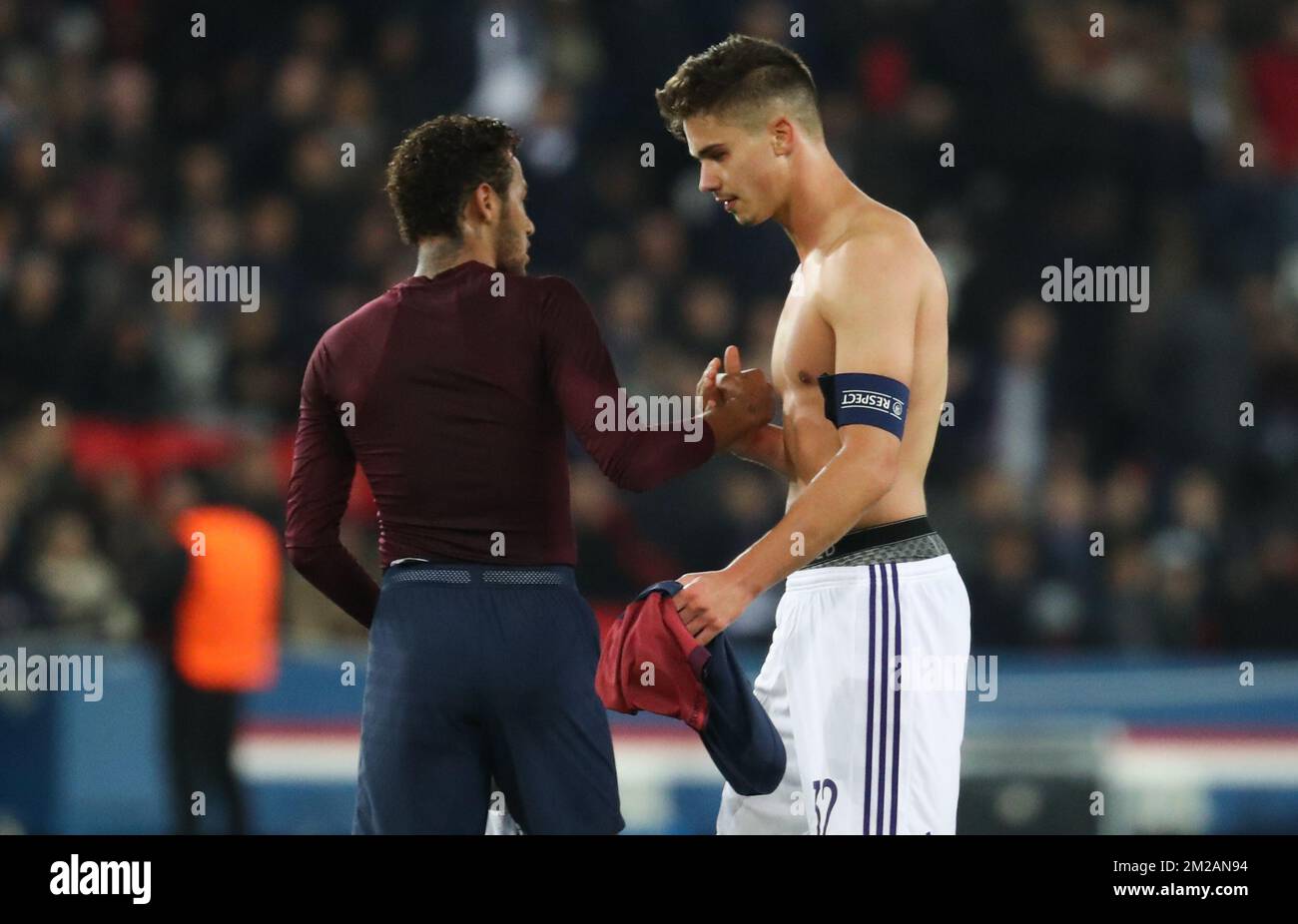 PSG's Neymar Jr and Anderlecht's Leander Dendoncker pictured after a soccer game between French ...