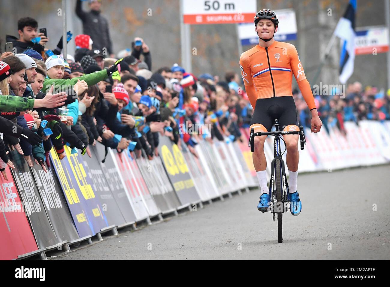 Dutch Mathieu Van Der Poel celebrates as he crosses the finish line to ...