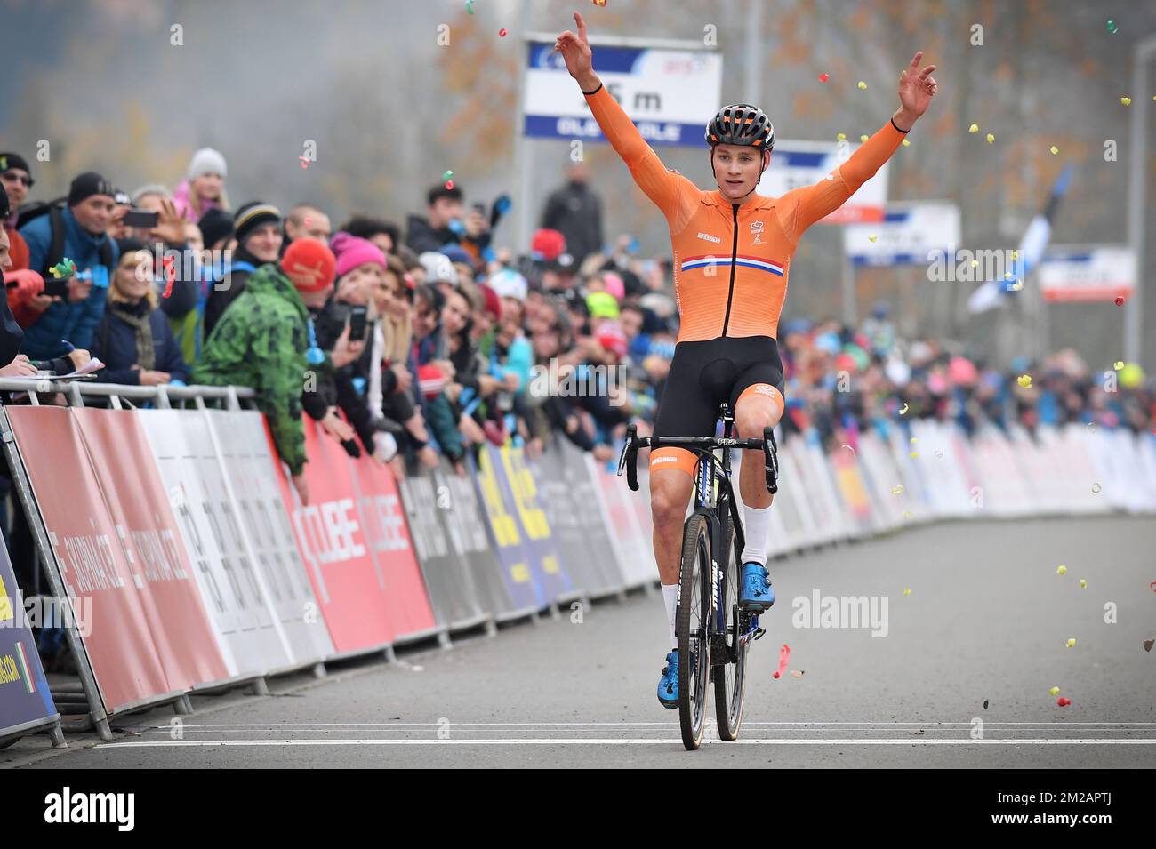 Dutch Mathieu Van Der Poel celebrates as he crosses the finish line to ...