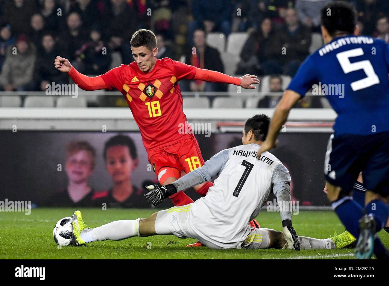 Belgium's Thorgan Hazard and Japan's goalkeeper Eiji Kawashima pictured ...