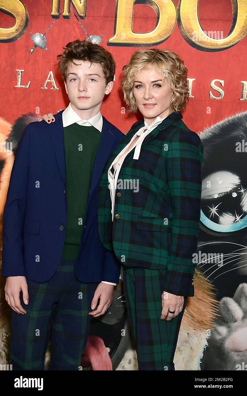 New York, New York, USA. December 13, 2022 Amy Carlson and son Nigel ...