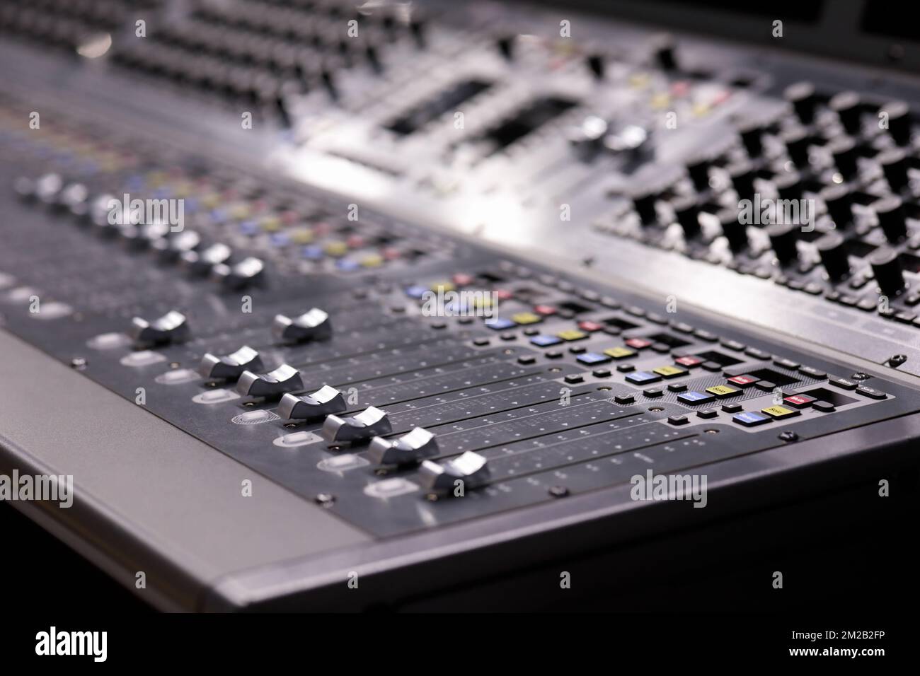 Professional digital audio mixing console close up. Selective focus Stock Photo - Alamy