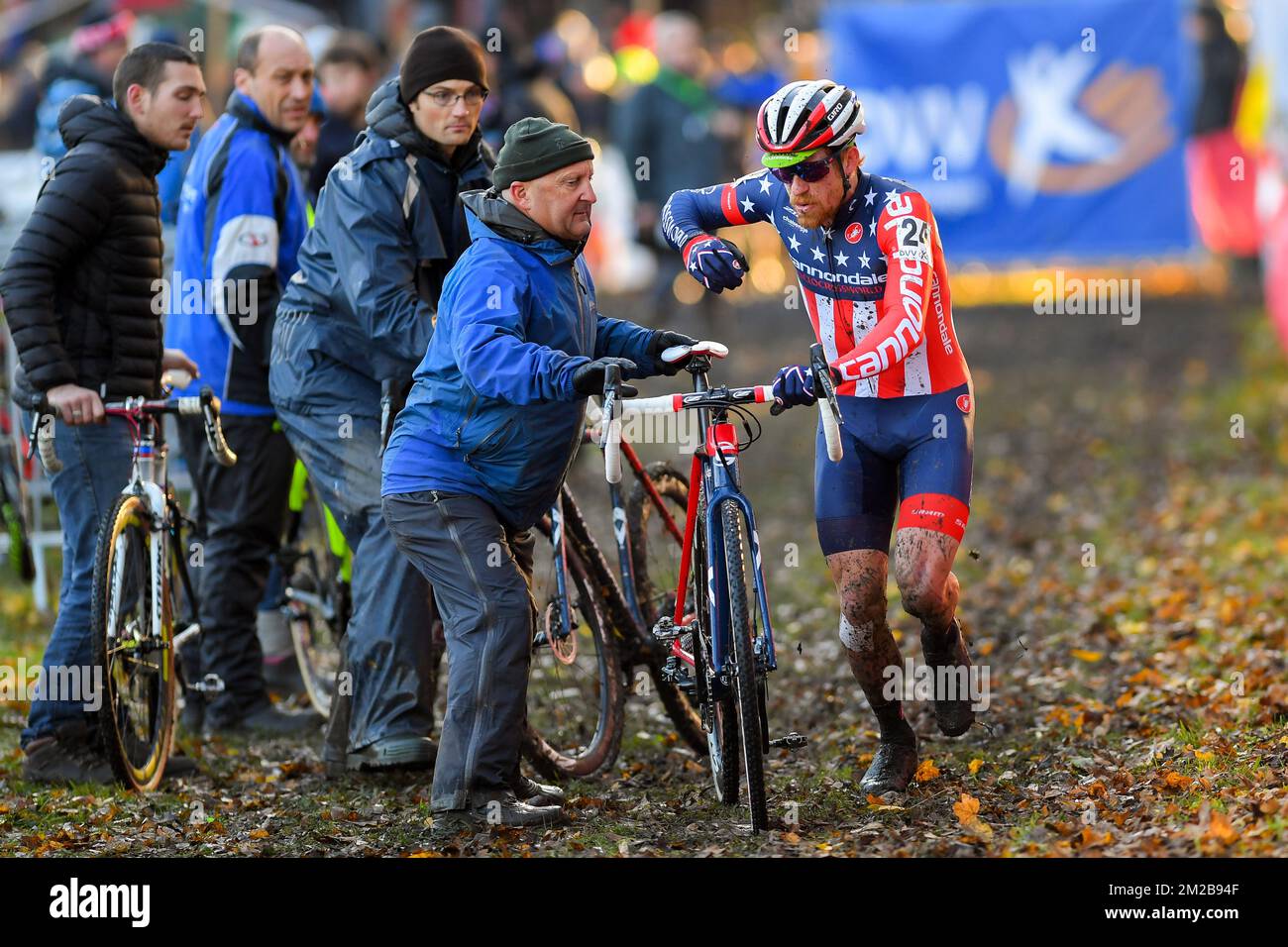 US Stephen Hyde changes his bike during the men's elite race of the ...