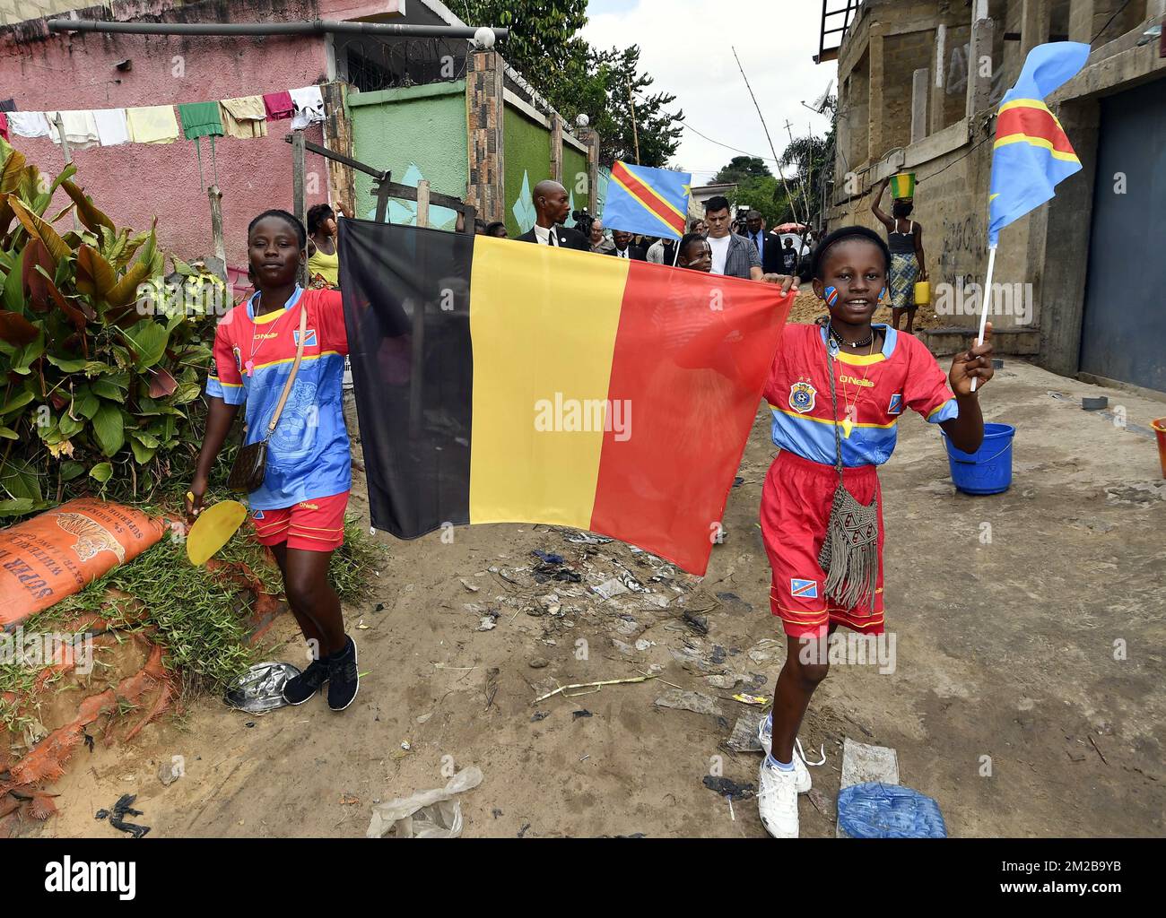 Illustration shows residents with a Belgian flag in marge of the ...