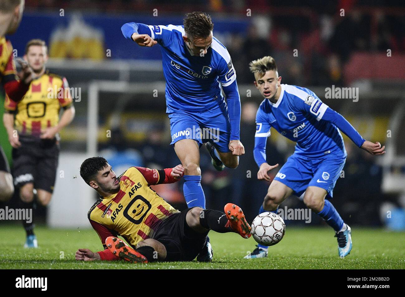 Mechelen's Elias Cobbaut and Genk's Marcus Ingvartsen fight for the ...