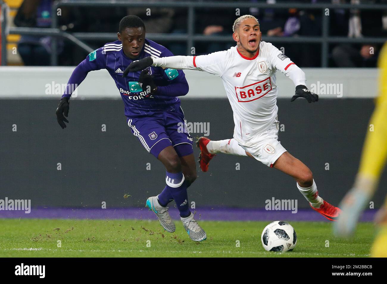 Anderlecht's Dennis Appiah and Standard's Junior Edmilson fight for the ...