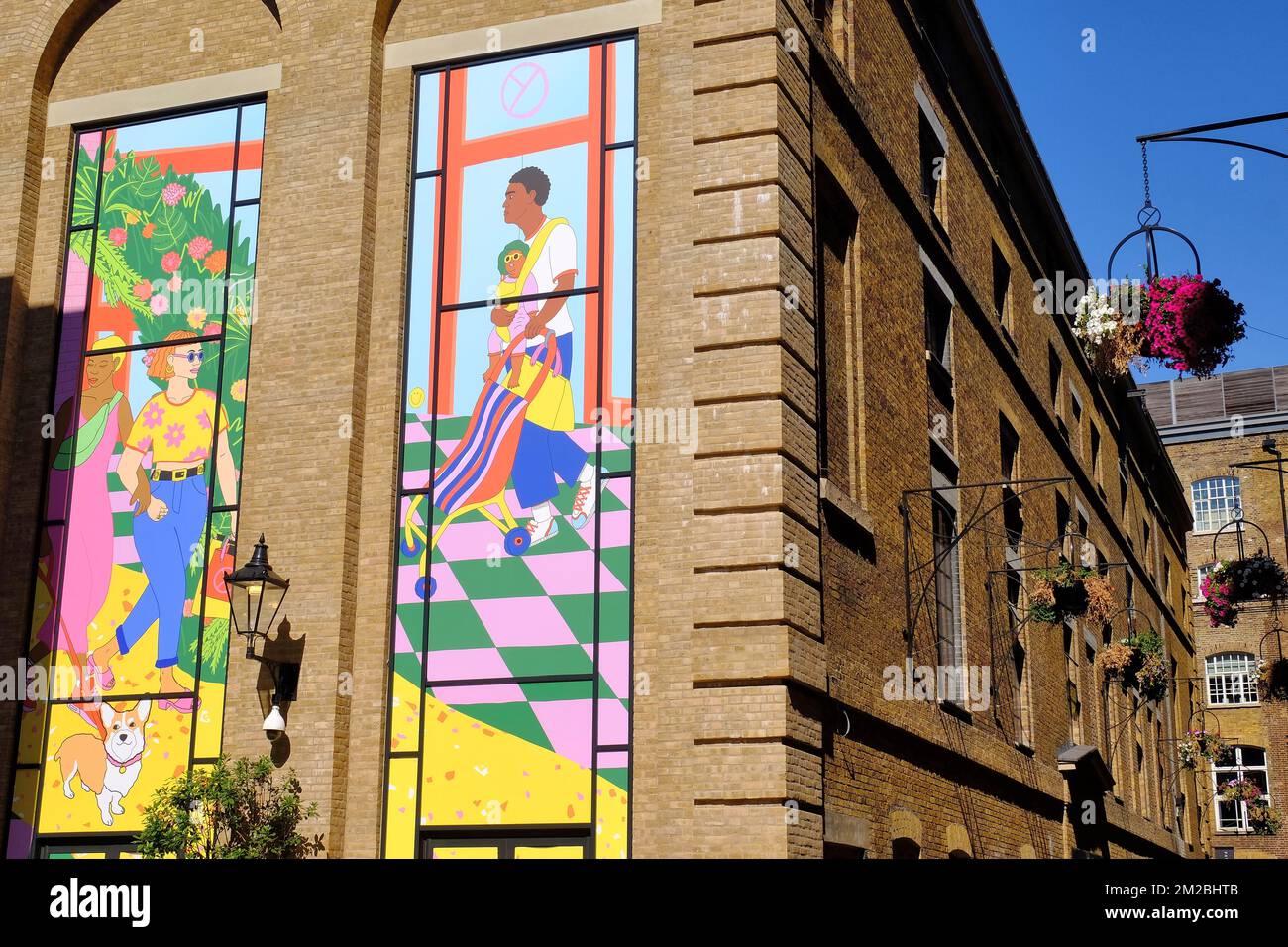 Colourful large murals including a corgi at Langley Street and Mercer ...