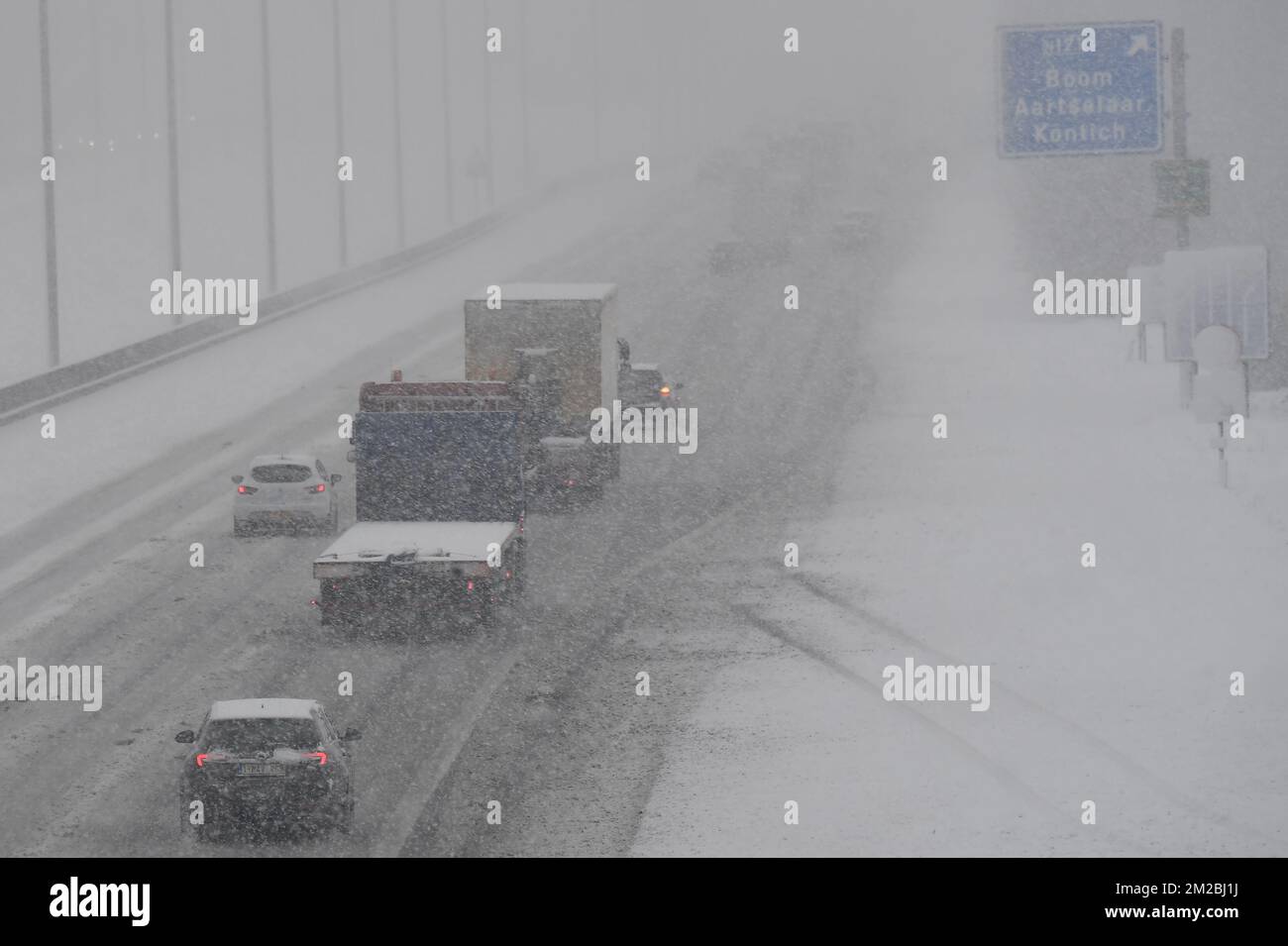 Illustration picture shows cars and trucks on the snowy E19 high way ...