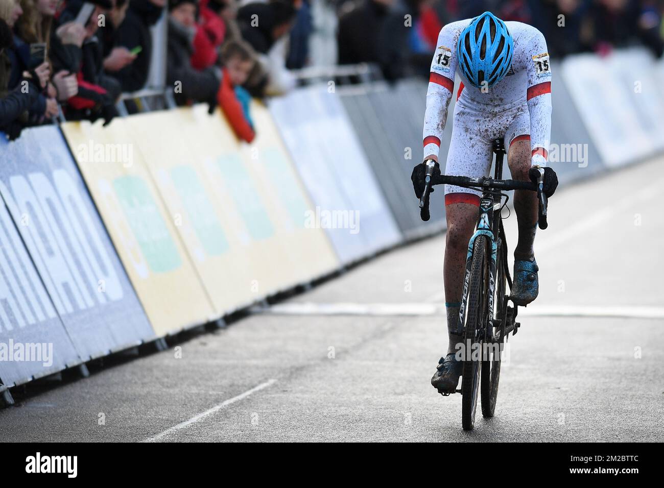 Dutch Pim Ronhaar crosses the finish line at the men junior race of the ...