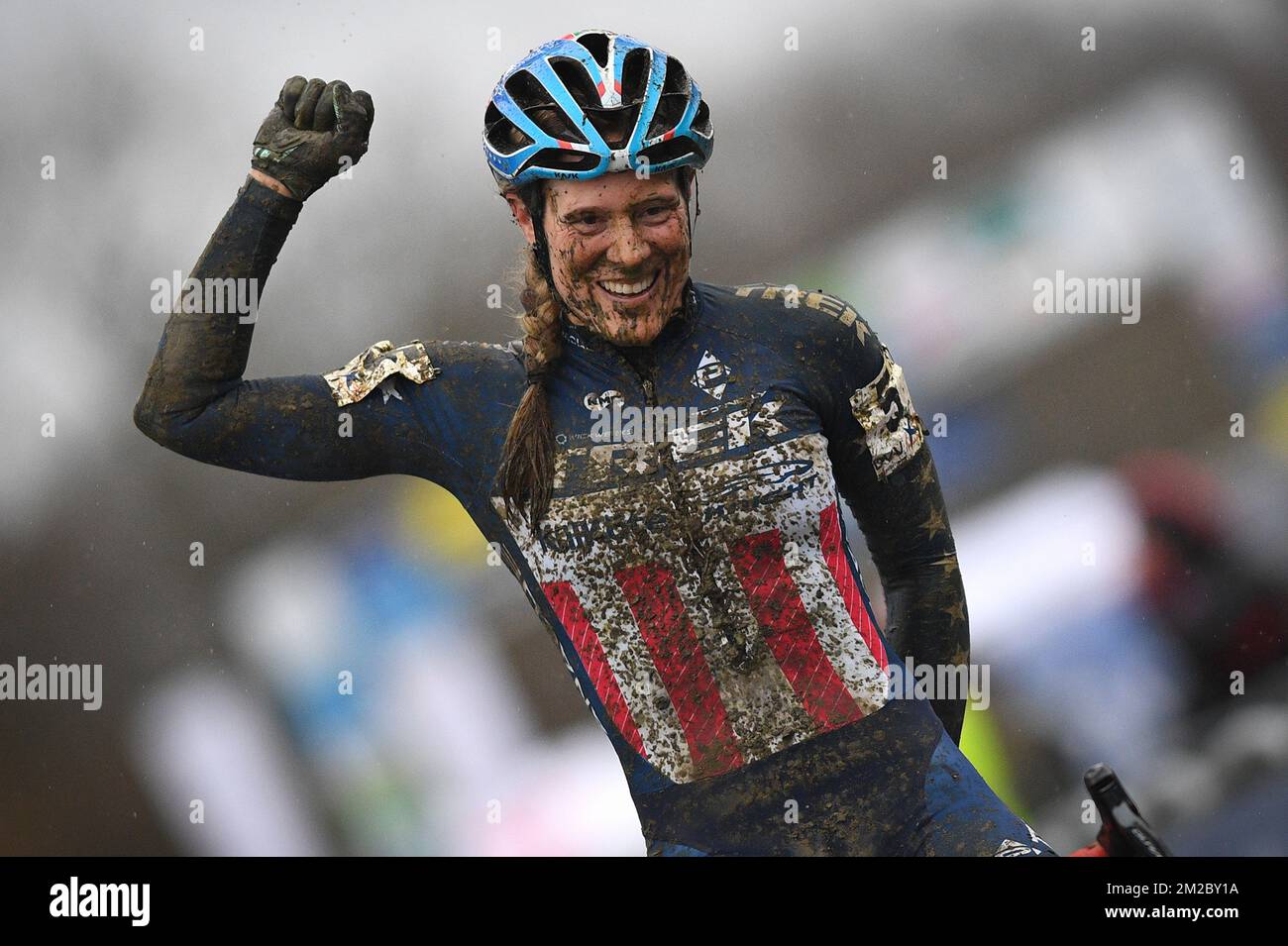 US Katie Compton celebrates as she crosses the finish line at the women ...