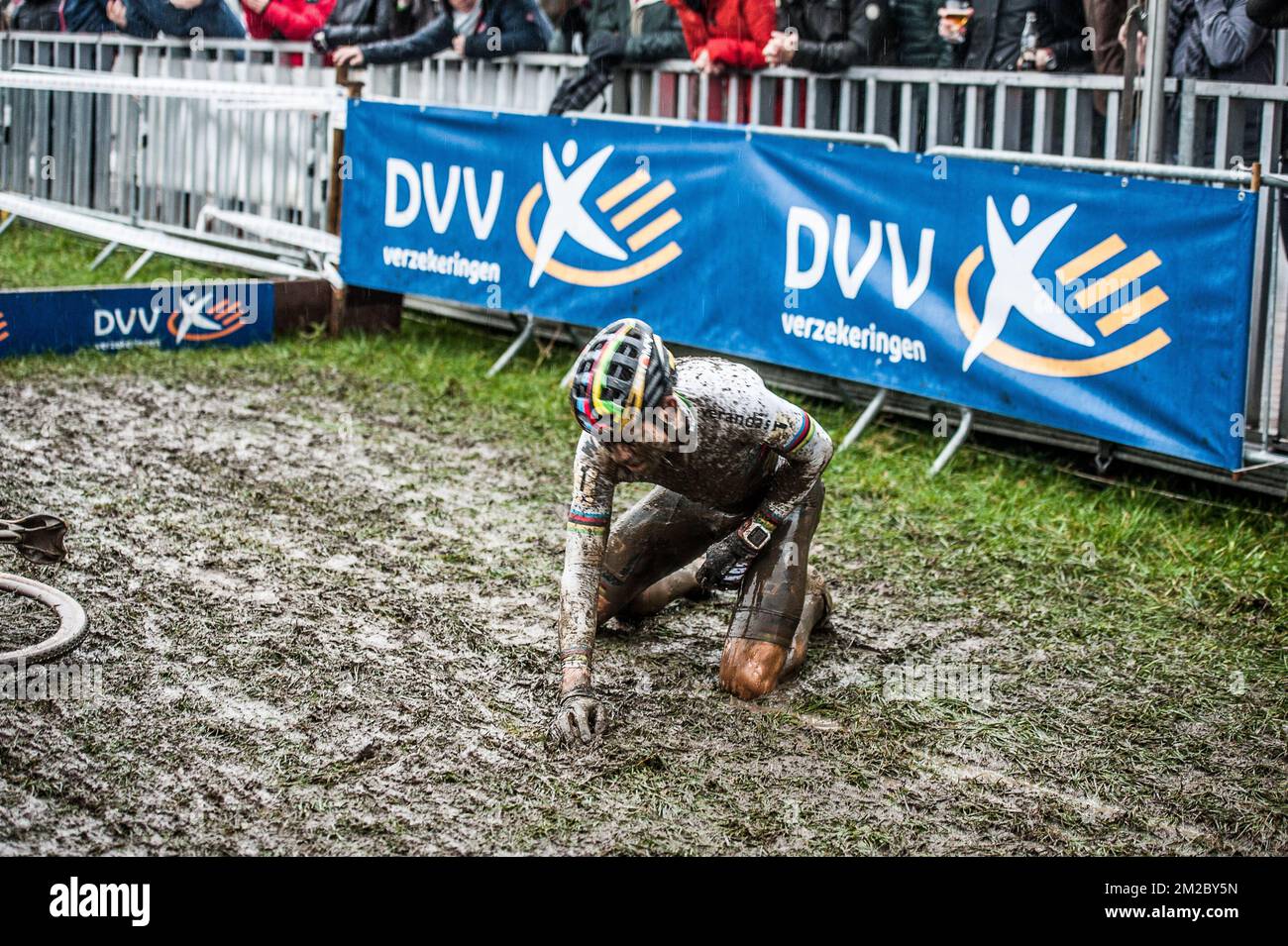 Belgian Wout Van Aert falls in the last round of the men elite race of ...