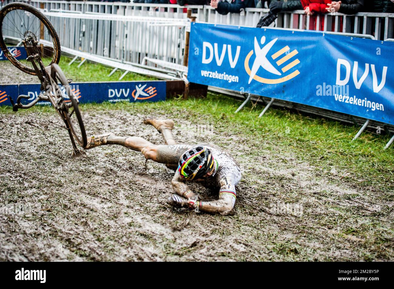 Belgian Wout Van Aert falls in the last round of the men elite race of ...