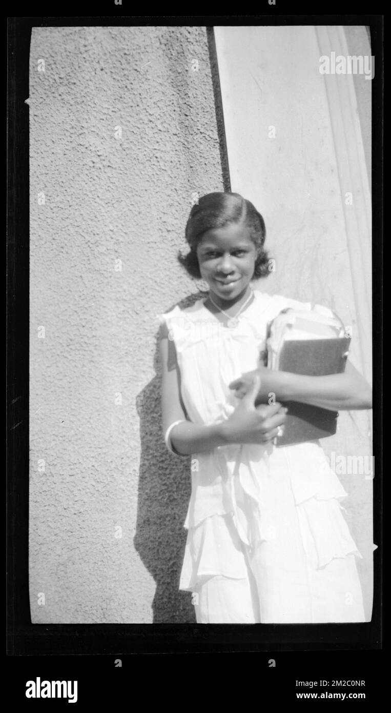 Constance Miller stands with books in her arms ,. Jack Miller ...