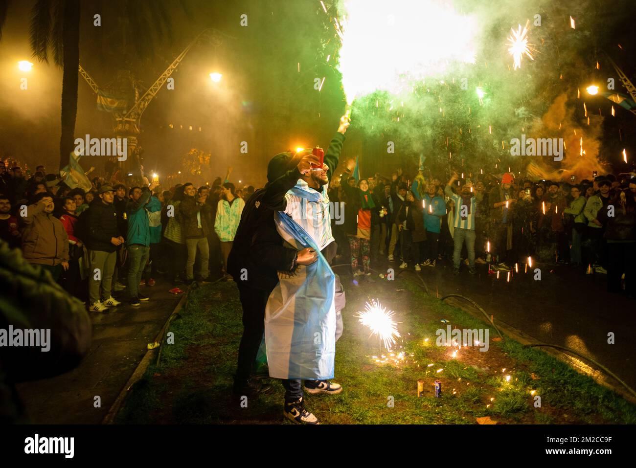 A fan wearing the Argentina football team t-shirt is seen holding a ...