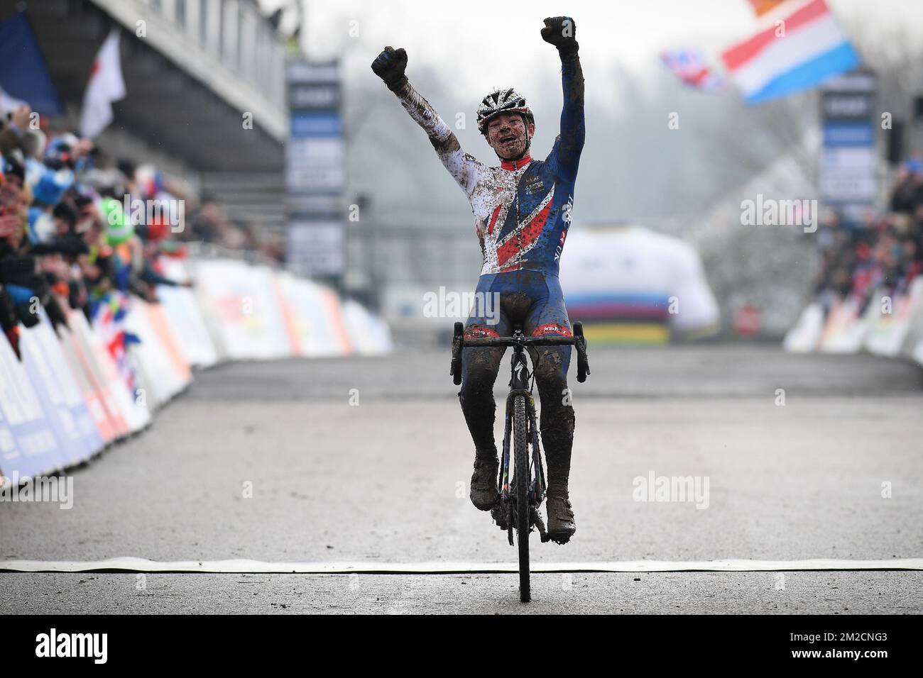 British Ben Tullet celebrates as he crosses the finish line to win the ...