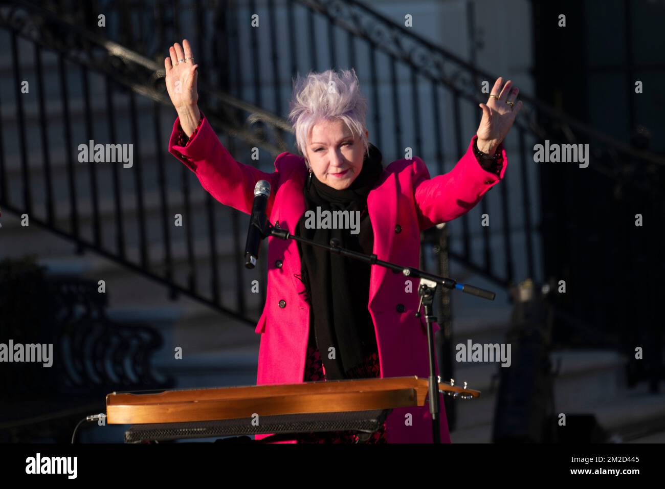 Singer Cyndi Lauper performs in a ceremony with US President Joe Biden ...