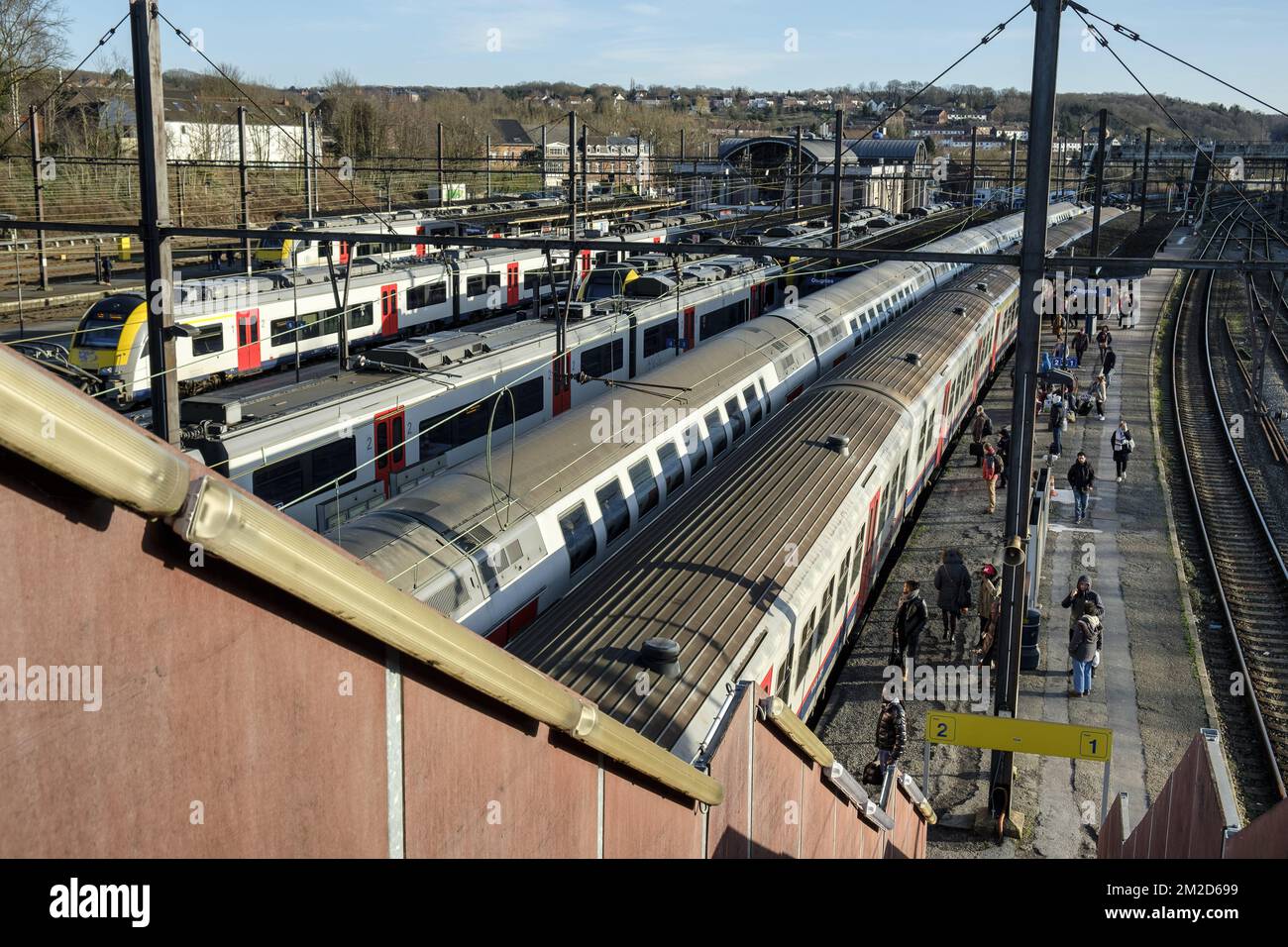 Train station and train along the platform in Ottignies station | SNCB ...