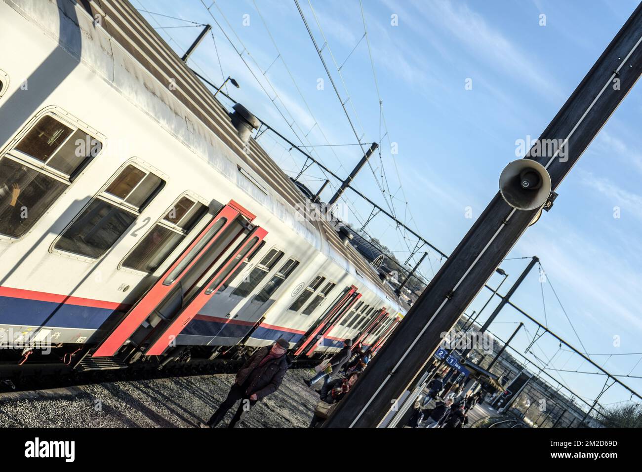Train station and train along the platform in Ottignies station | SNCB ...