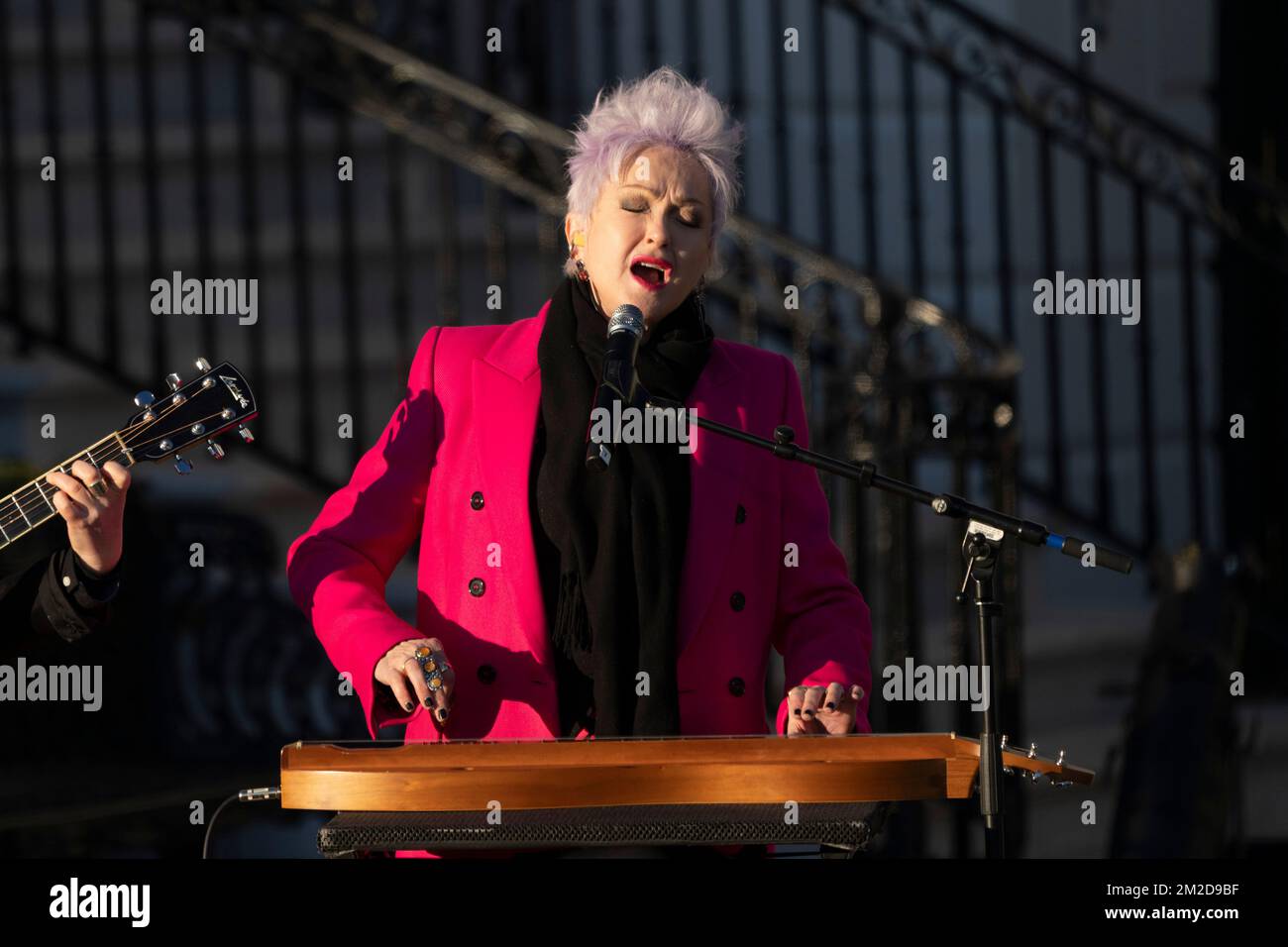 Singer Cyndi Lauper performs in a ceremony with US President Joe Biden ...
