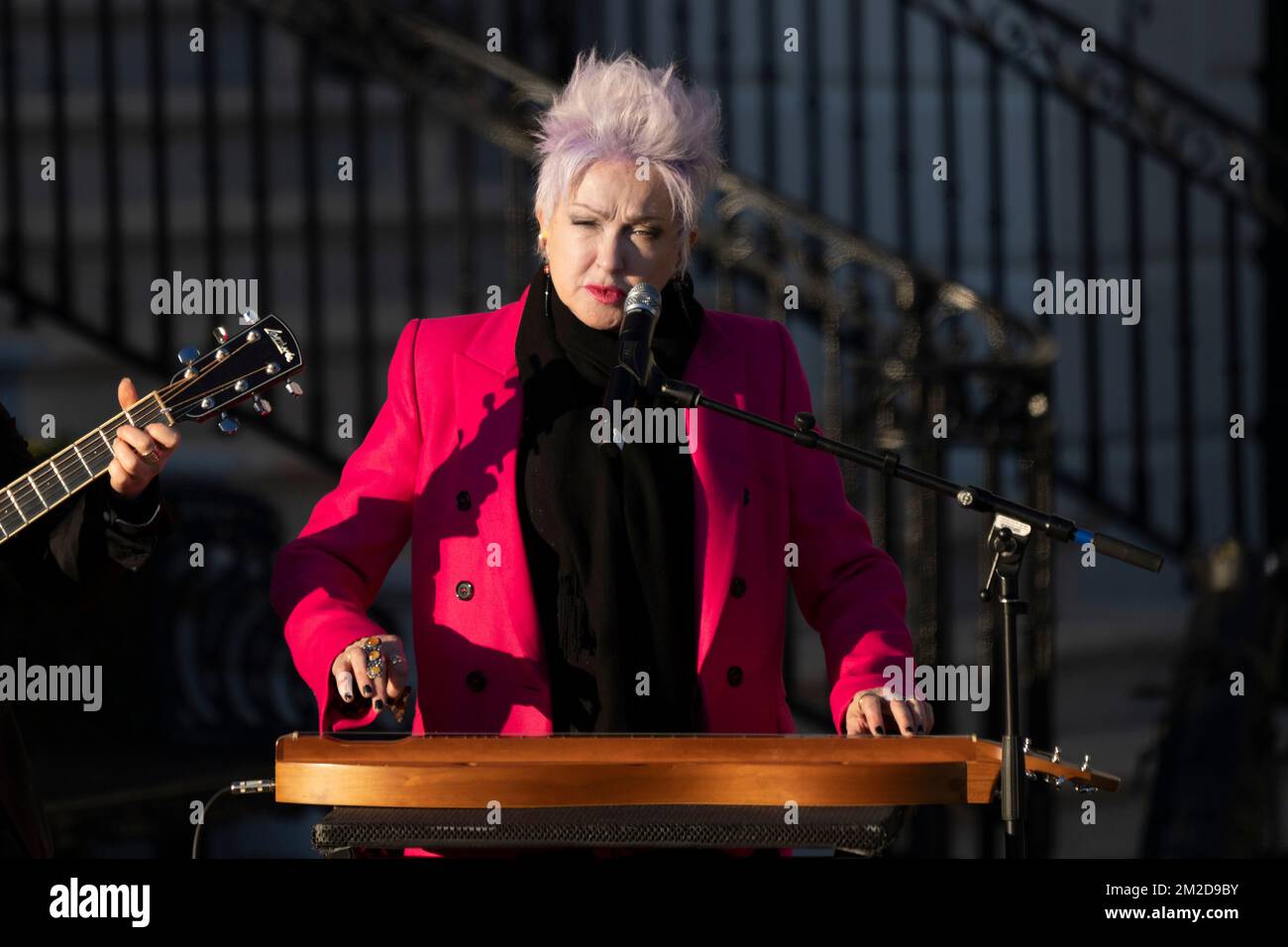 Singer Cyndi Lauper performs in a ceremony with US President Joe Biden ...