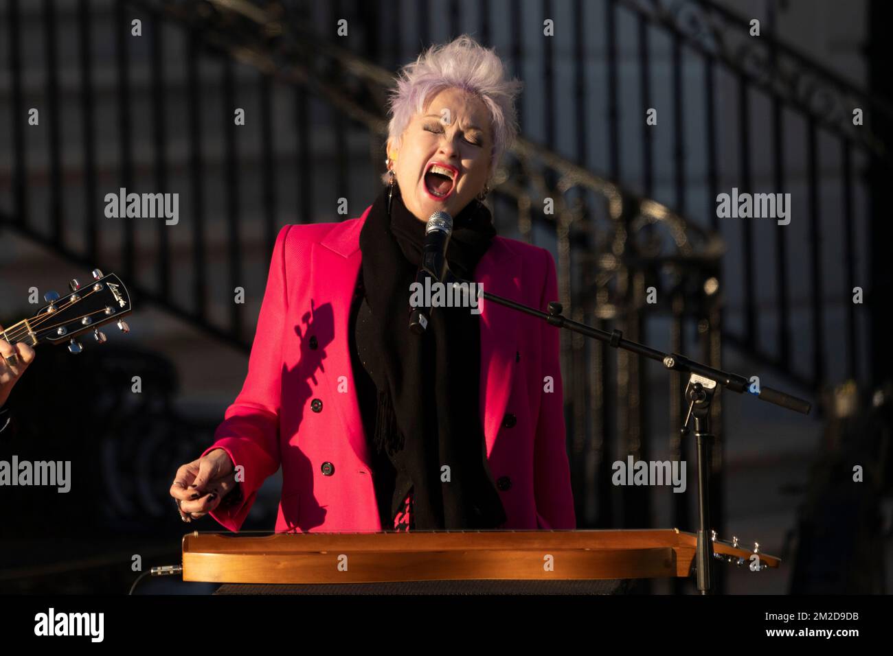 Singer Cyndi Lauper performs in a ceremony with US President Joe Biden ...