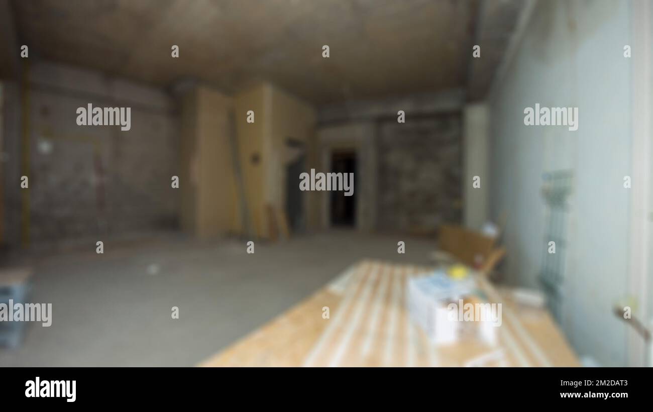 Interior construction of new house project with grey cement wall ...