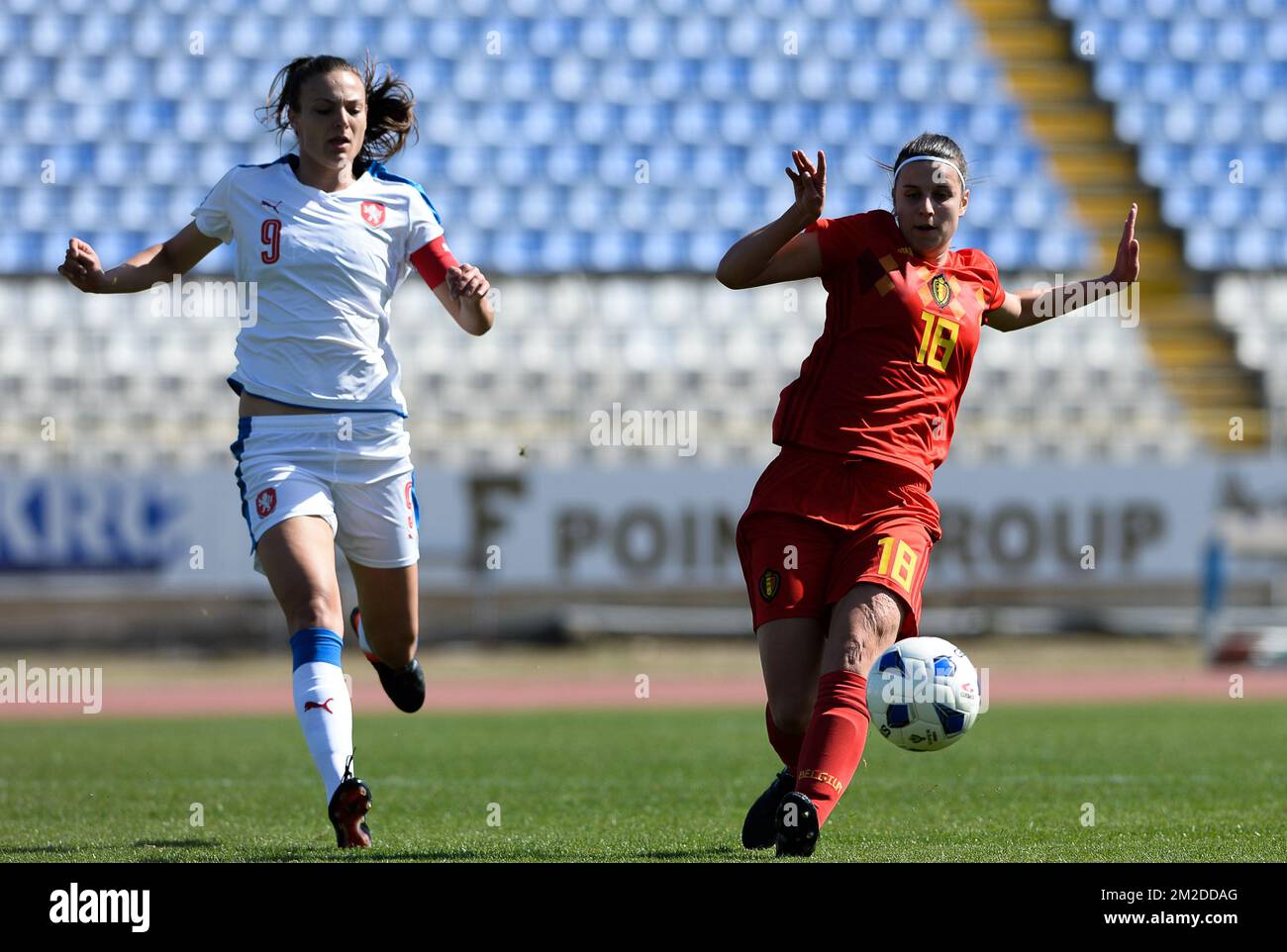 Belgium's Laura De Neve and Czech Lucie Vonkova fight for the ball ...
