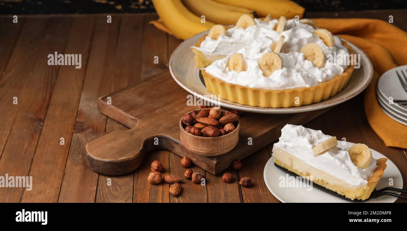 Tasty banana cake on wooden background Stock Photo - Alamy
