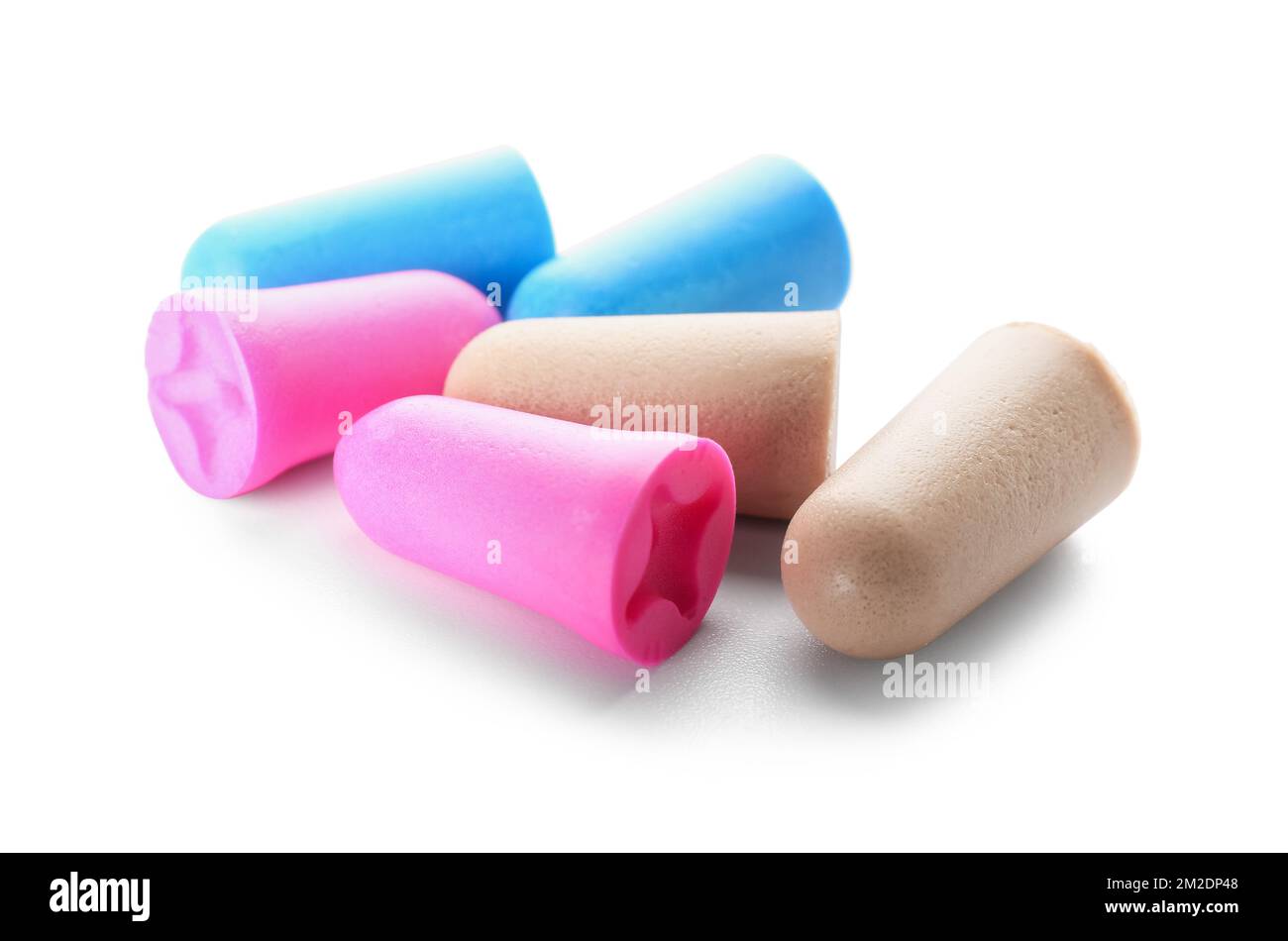 Different ear plugs on white background Stock Photo - Alamy