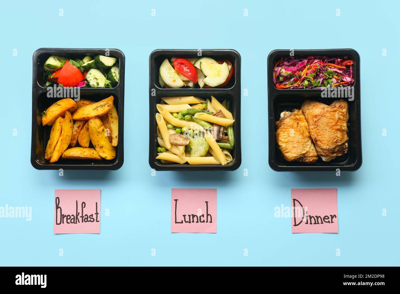 Food containers with different meal and sticky notes with words ...
