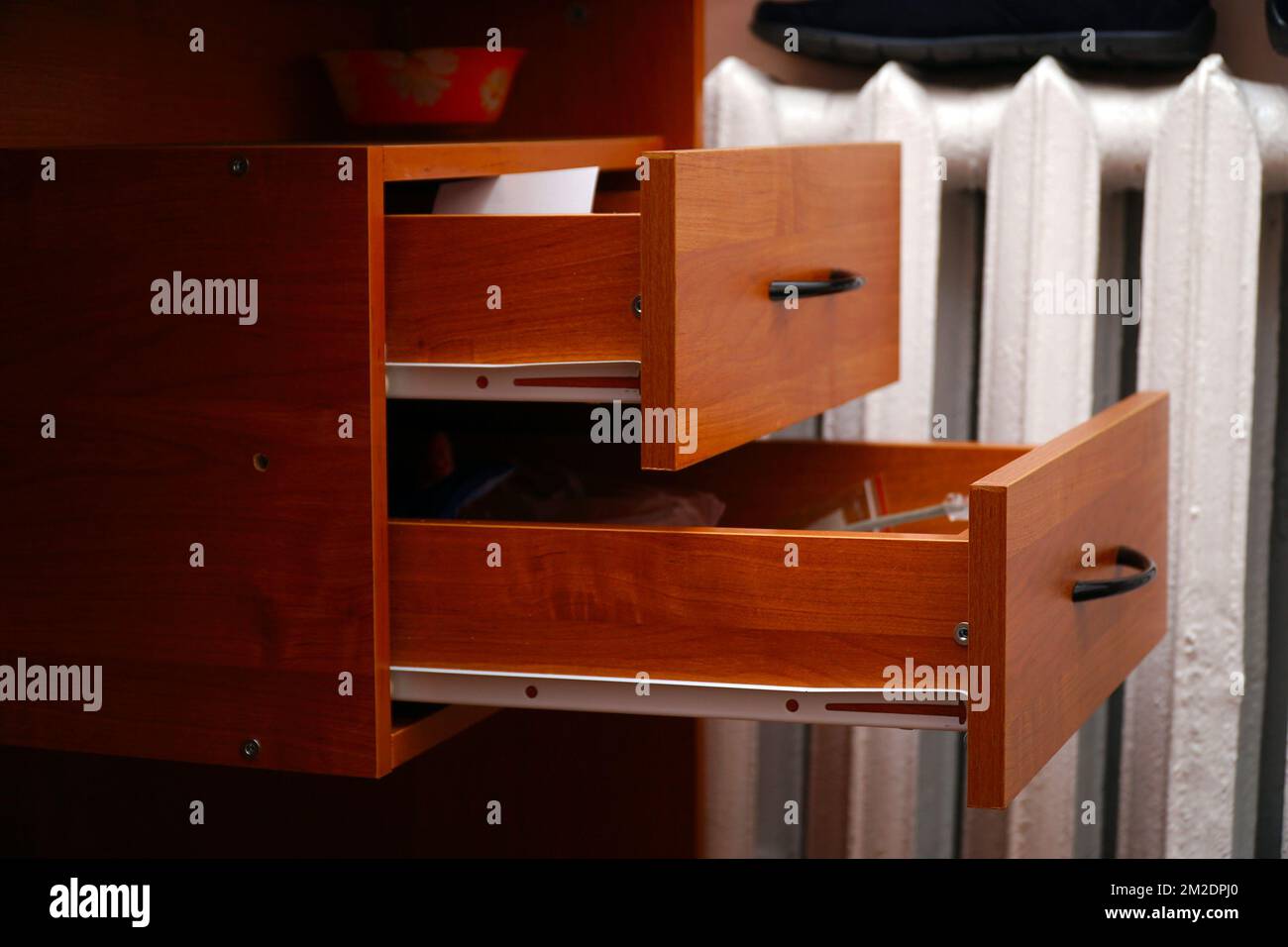 Open drawers of a wooden desk Stock Photo - Alamy