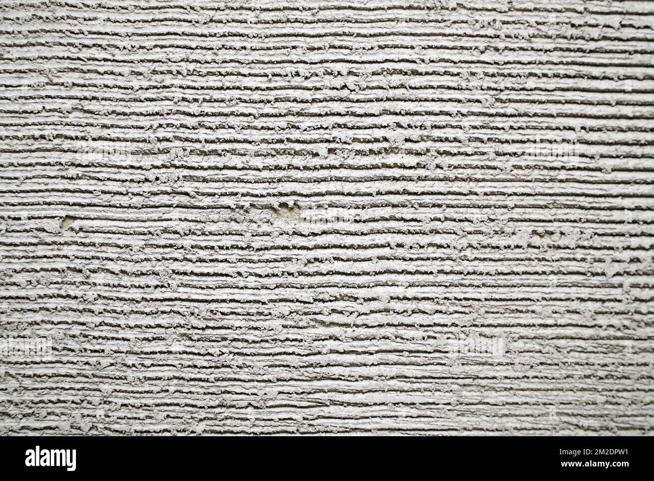 Gray decorative plaster on the wall with pressed horizontal stripes. Plaster background Stock ...