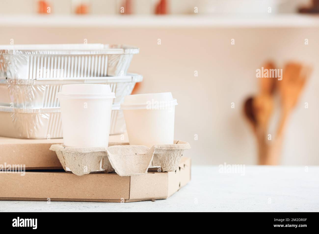 Set of different food delivery containers on white table Stock Photo ...