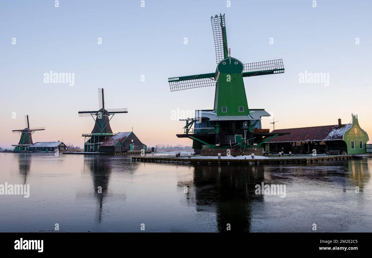 Zaanse Schans windmill village during winter with snow landscape in the ...