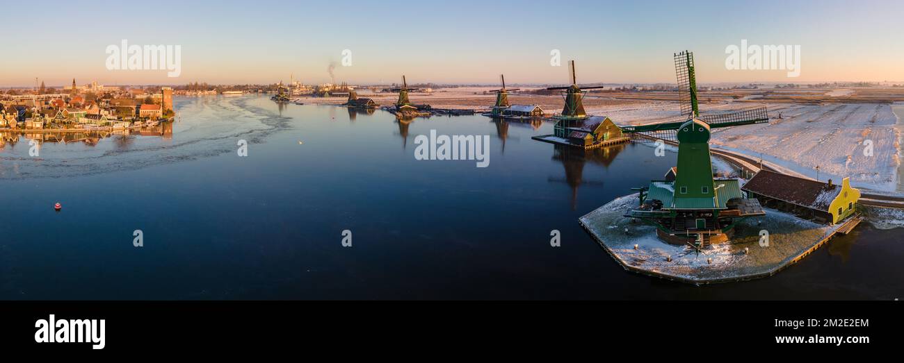 Zaanse Schans windmill village during winter with snow landscape in the ...
