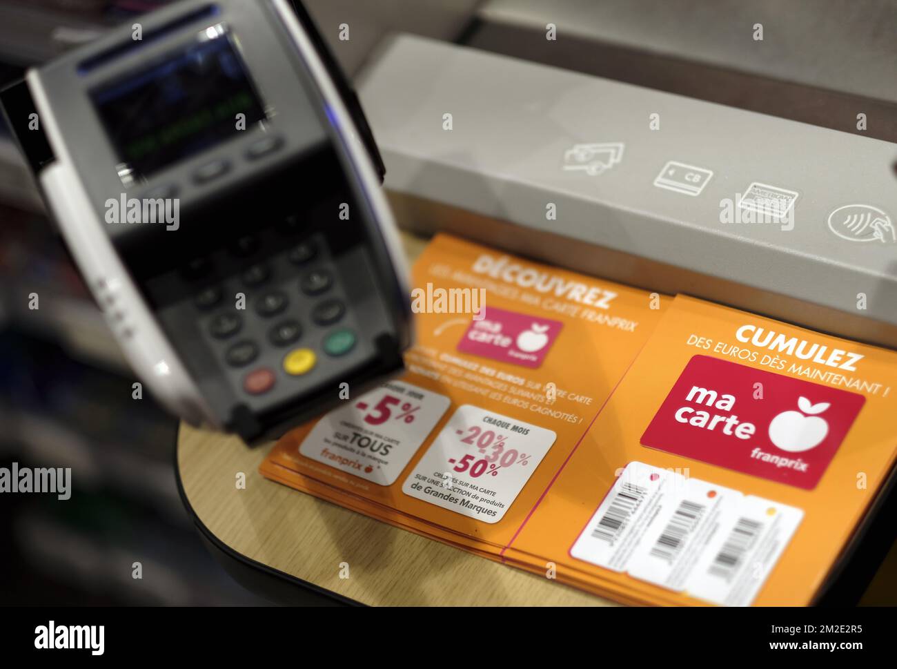 Illustration shows the fidelity card at the new store of French ...