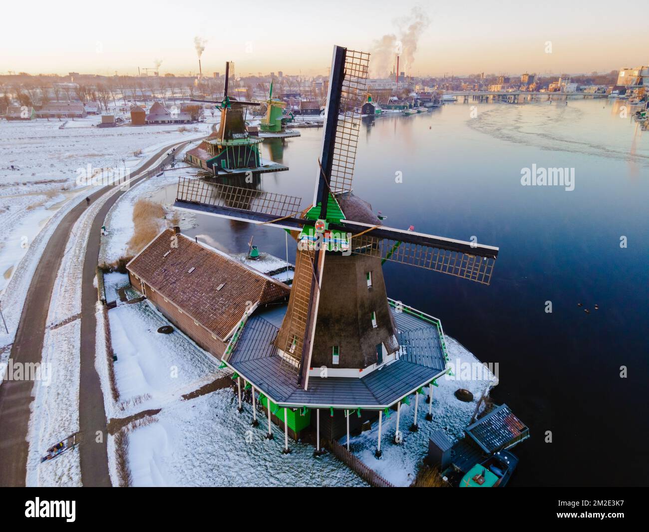 Drone view at the Zaanse Schans windmill village during winter with ...