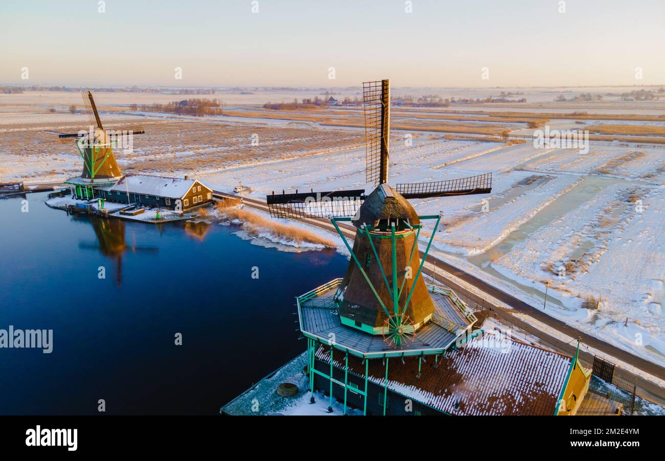 Zaanse Schans windmill village during winter with snow landscape in the ...