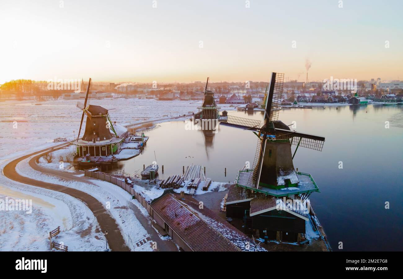 Zaanse Schans windmill village during winter with snow landscape in the ...
