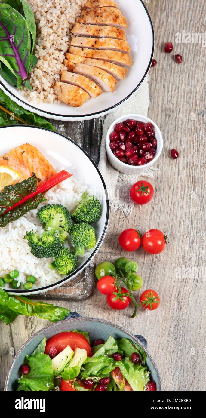 Table of various healthy food dishes. Healthy food assortment. Dieting ...