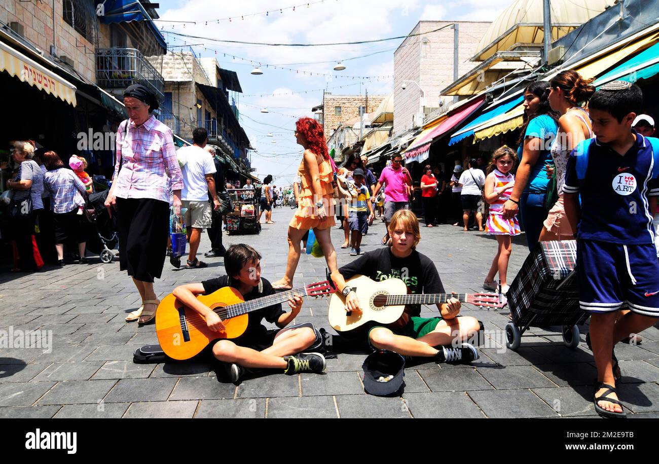 Children playing their guitars at the vibrant Machane Yehuda market in ...