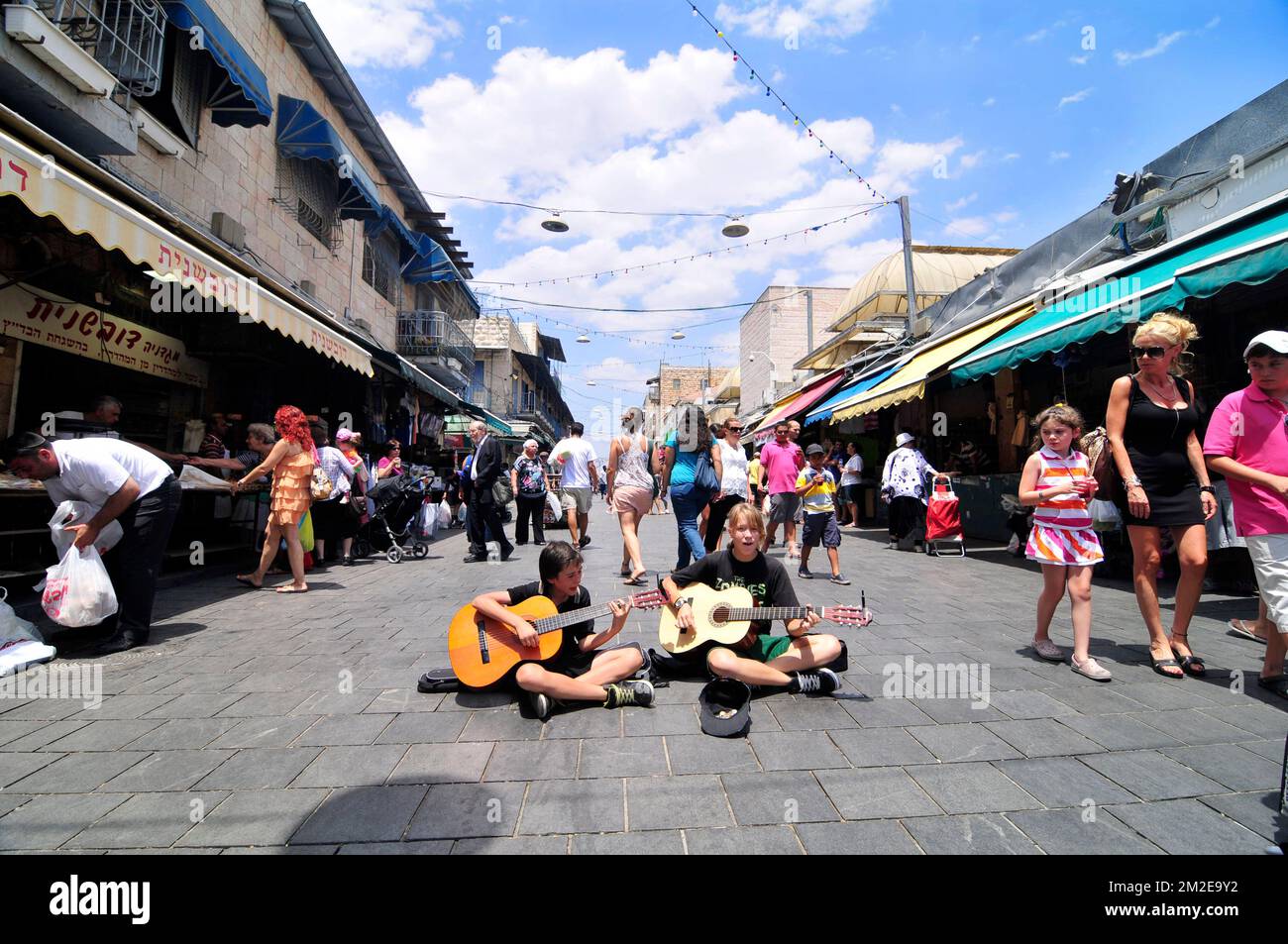 Children playing their guitars at the vibrant Machane Yehuda market in ...