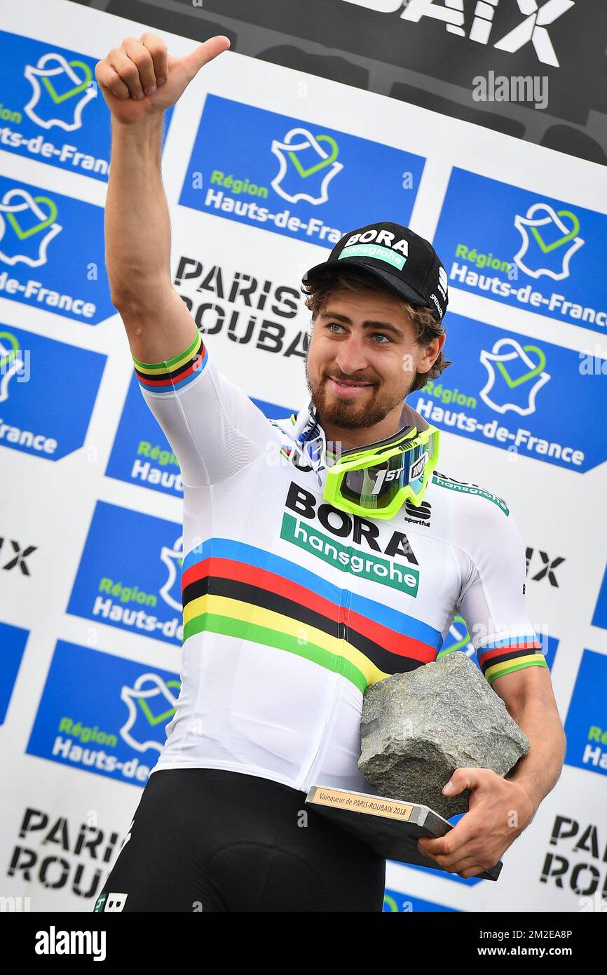 Slovakian Peter Sagan of Bora-Hansgrohe celebrates on the podium with ...