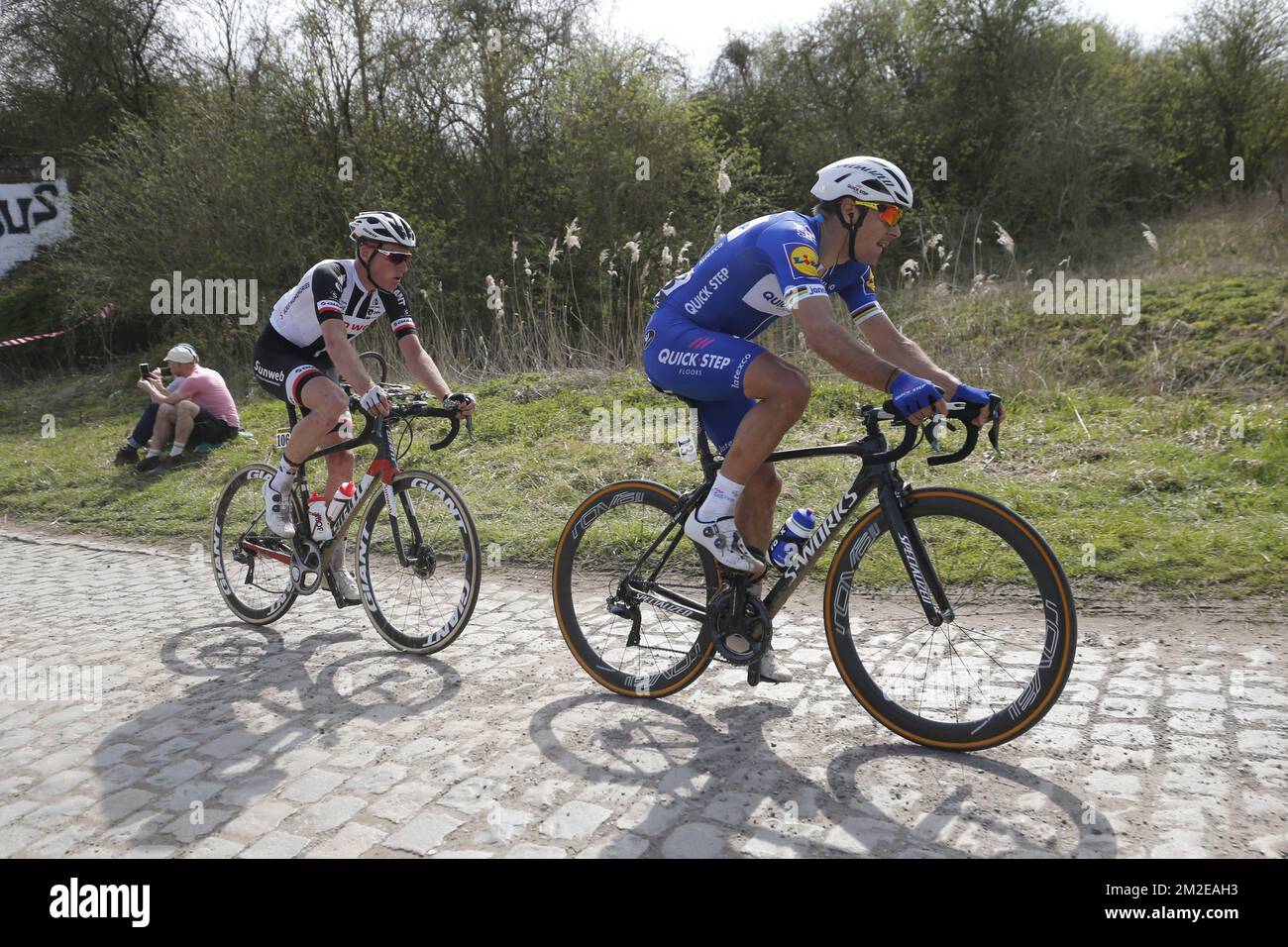 Dutch Mike Teunissen of Team Sunweb and Belgian Philippe Gilbert of ...