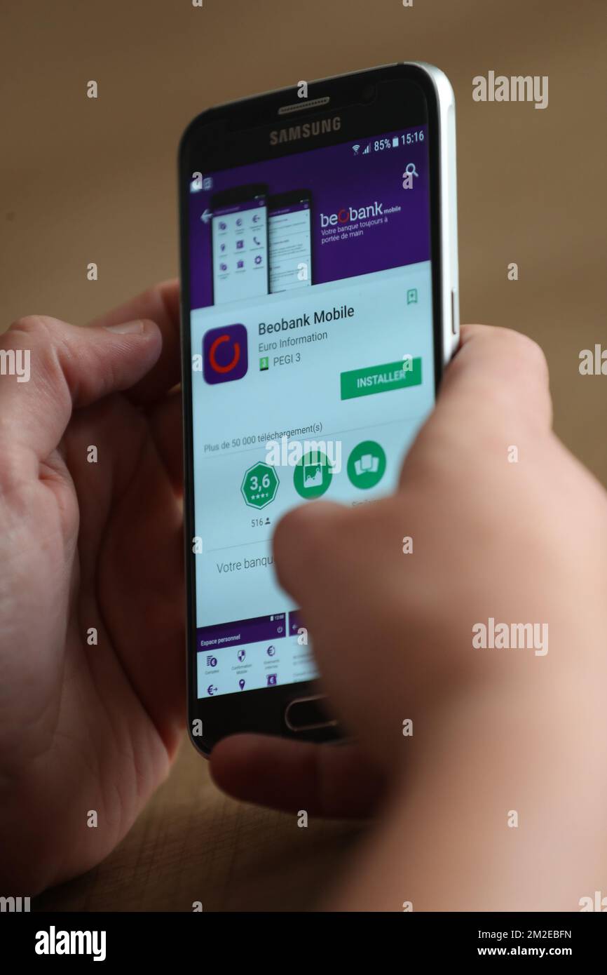 Illustration picture shows the installation of the mobile phone app of bank Beobank in Dutch ...