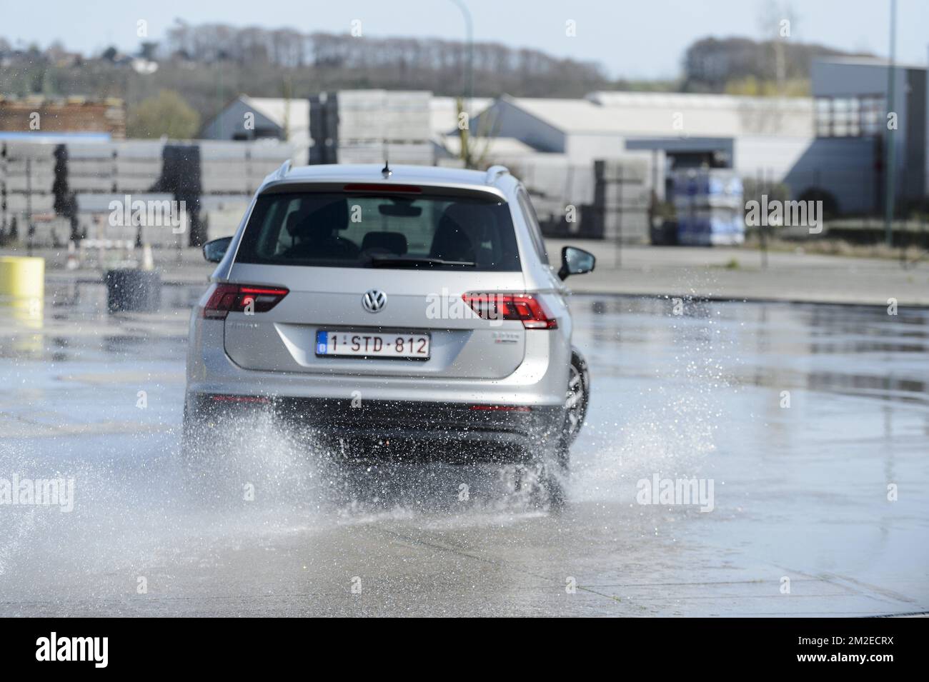 Defensive driving training in heavy rain or frozen roads conditions ...
