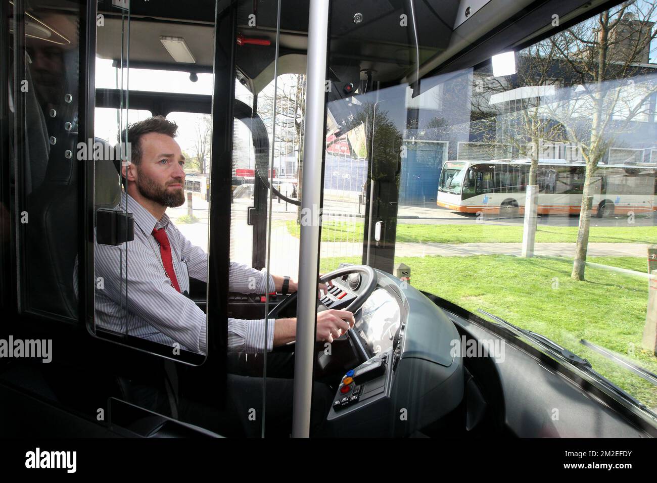 A bus driver pictured in action during the presentation of the first ...