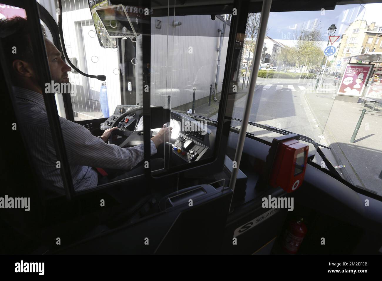 A bus driver pictured in action during the presentation of the first ...