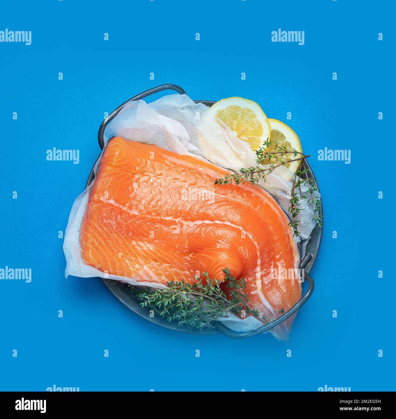 Salmon. Healthy food on color background. Top view Stock Photo - Alamy