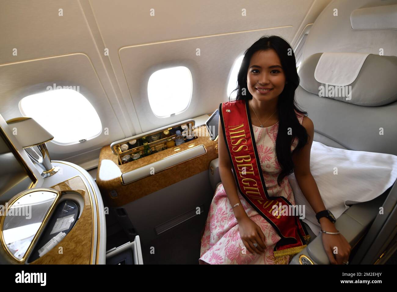 Miss Belgium 2018 Angeline Flor Pua sits in the first class inside of ...